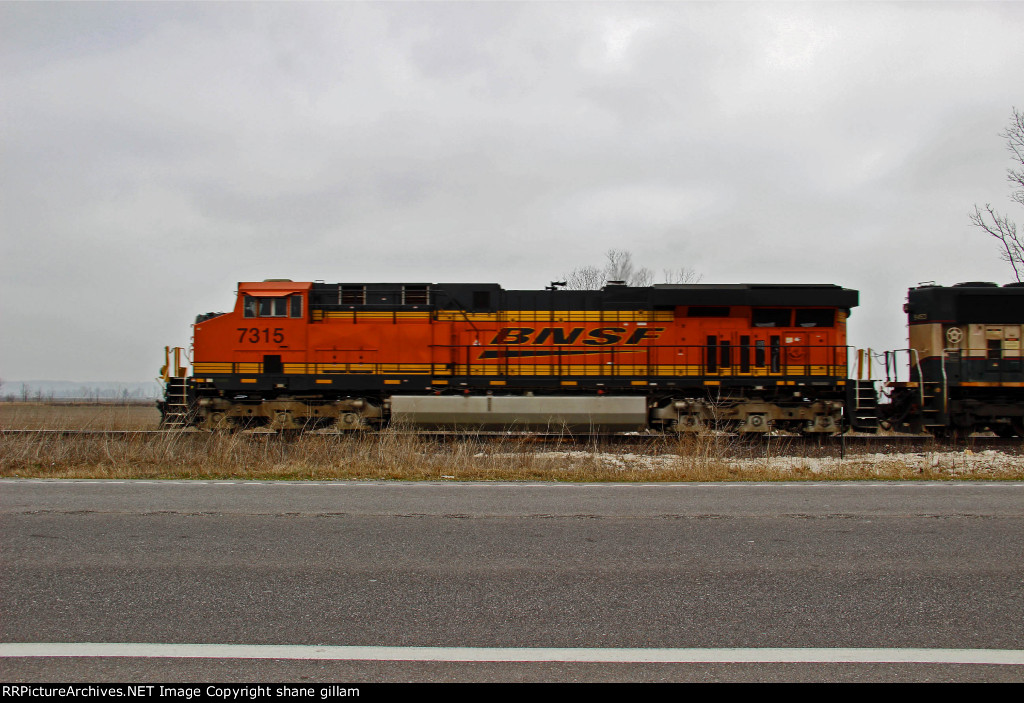 BNSF 7315 Leads a Nb grain train.